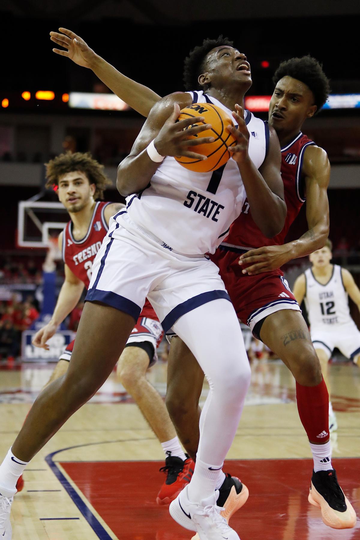 Great Osobor, Darius Brown II lead No. 22 Utah State to 77-73 OT win ...