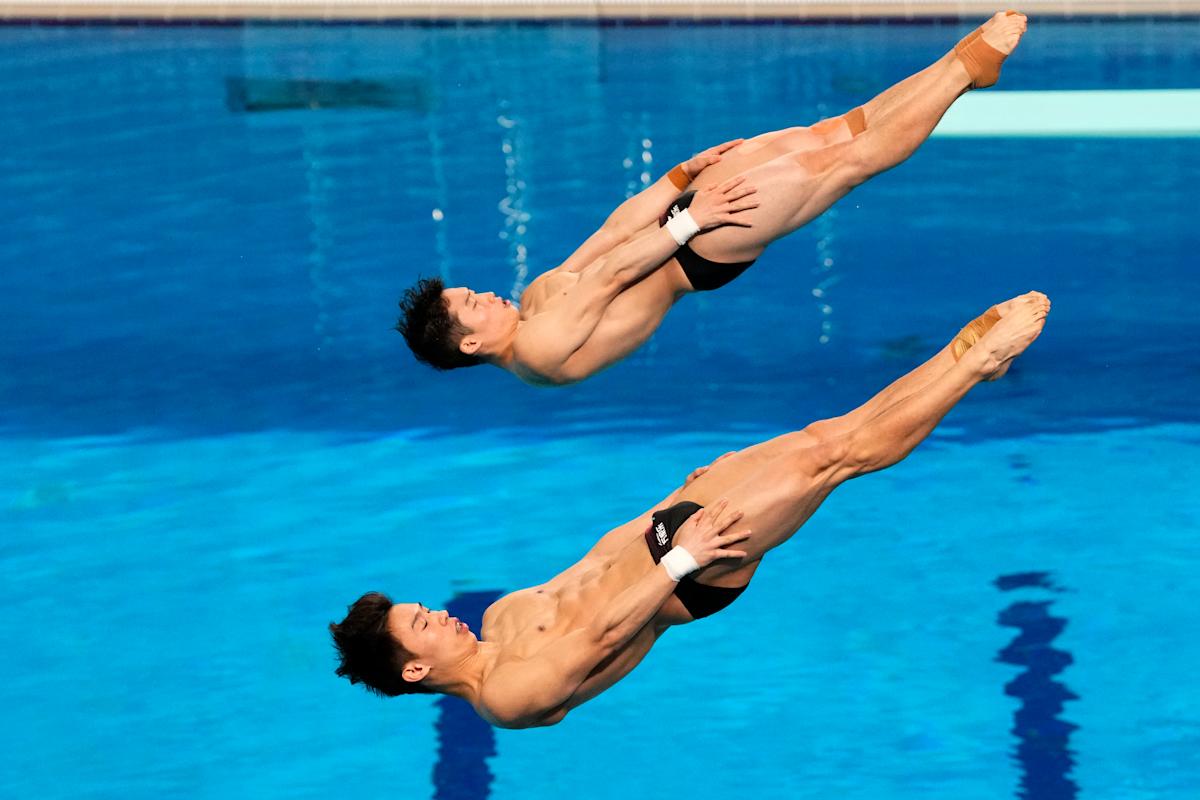 China extends winning streak in men's synchro diving at World Aquatics ...