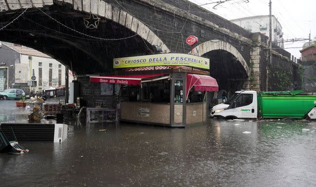 Sicily flooding: Two die after fierce storm batters Italian island as ...
