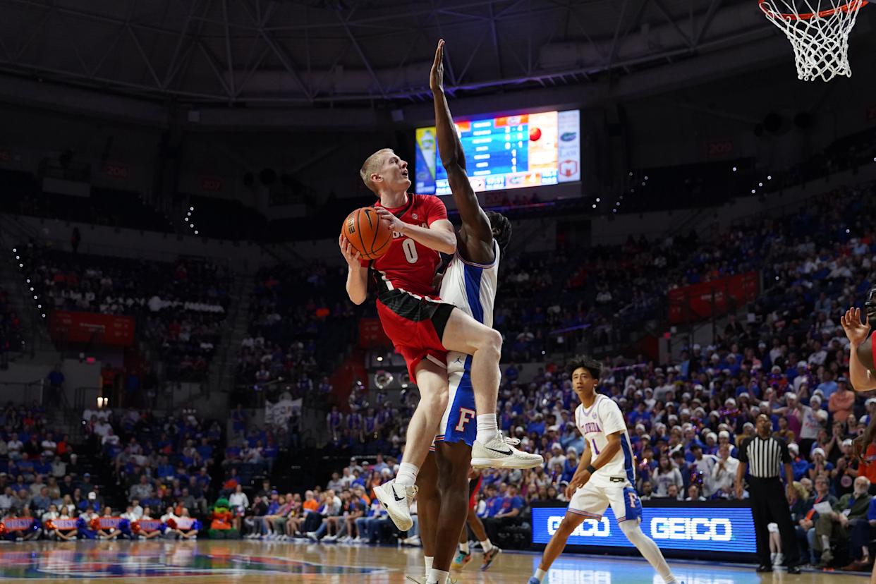 Newly unranked Florida pulls away from No. 18 Georgia late and wins 92-77
