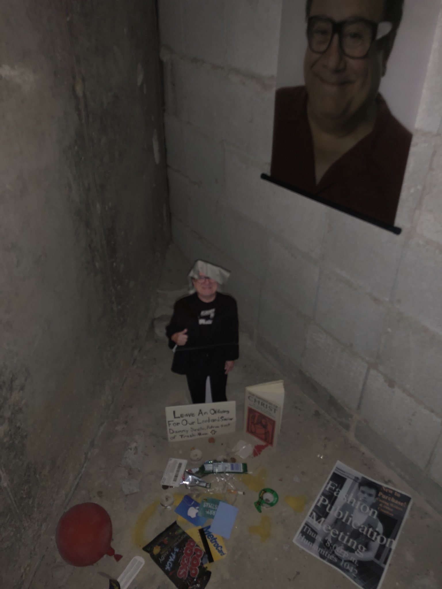 Story emerges behind bathroom shrine of Danny Devito