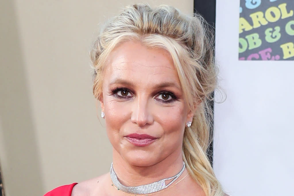 Britney Spears’ Crop Top, Low-Rise Shorts & Wedges Tackle the ...