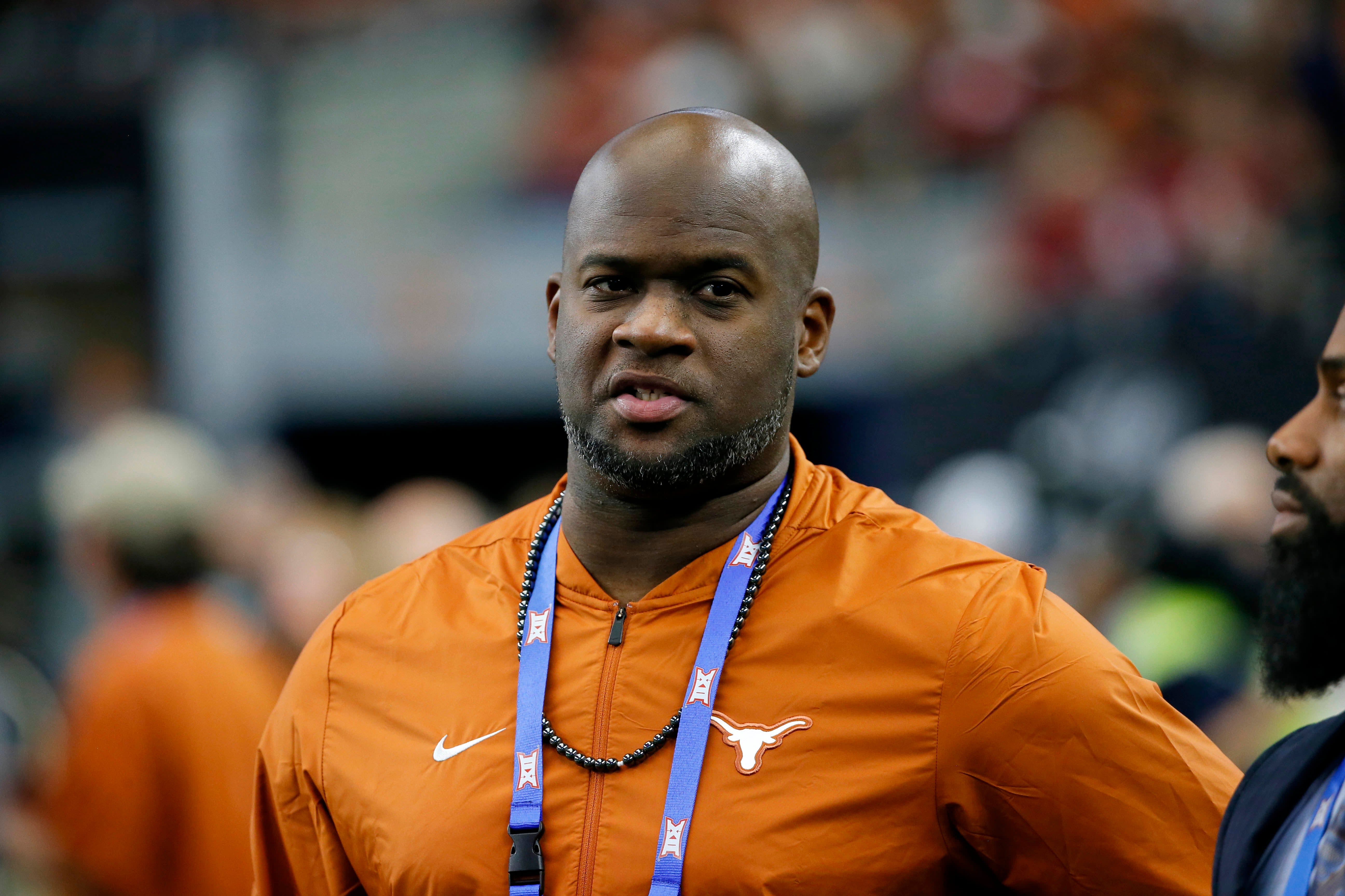 Texas fires football legend Vince Young